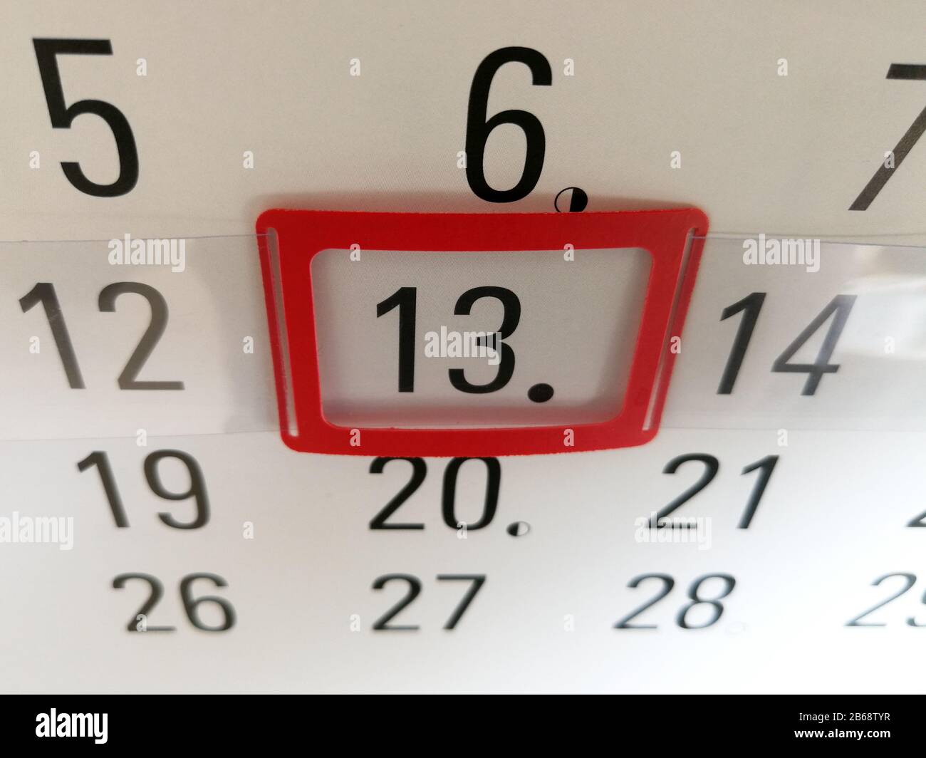 13th day marked with red marker on the office wall calendar Stock Photo ...