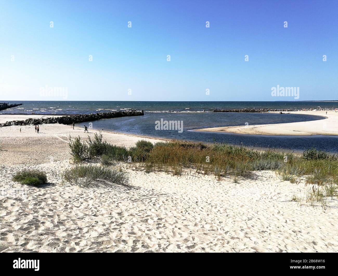 Sventoji river mouth at the Baltic sea beach in the Sventoji town Stock ...