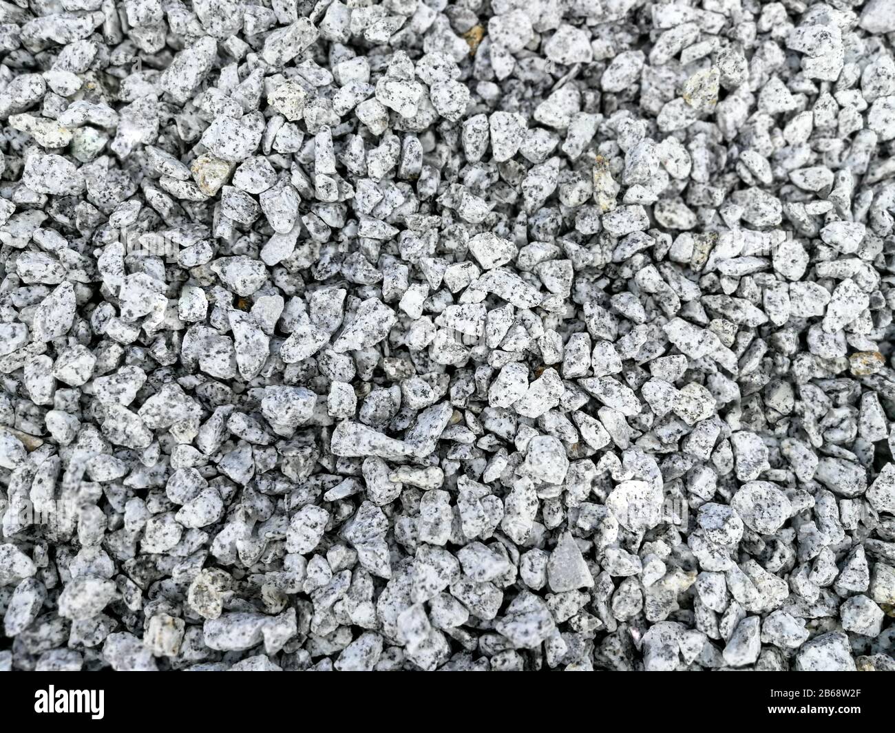 White gray granite break stone or gravel made from crushed rock for ...