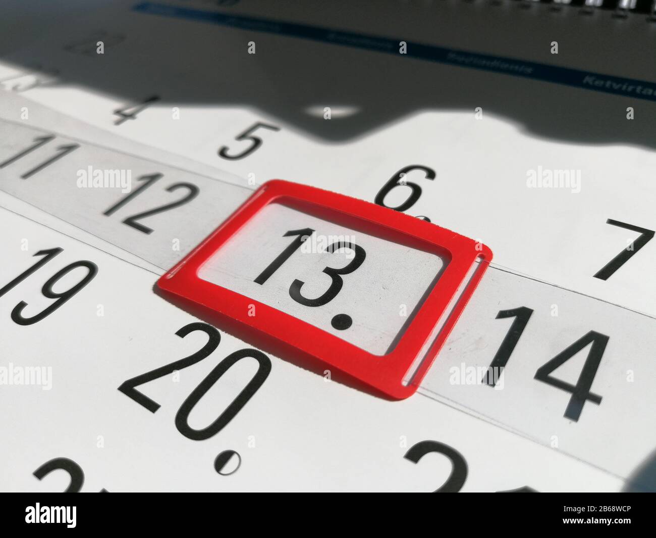 13th day marked with red marker on the office wall calendar Stock Photo ...