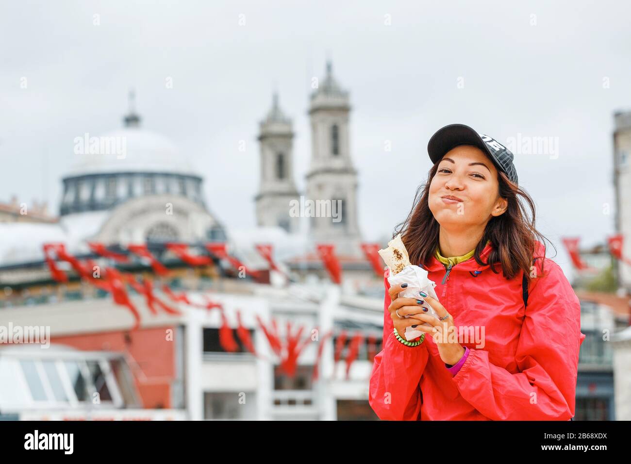 Young woman eating turkish fast food in Istanbul, Turkey Stock Photo ...