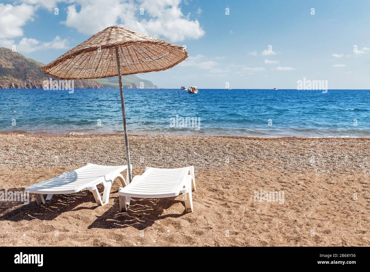 Sunbeds on sandy beach in Turkey Stock Photo - Alamy