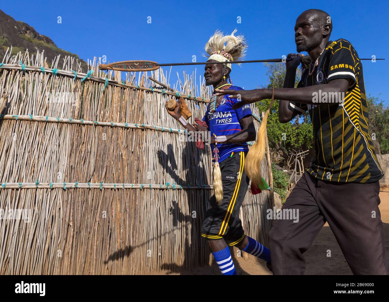Larim tribe men dancing during a wedding ceremony, Boya Mountains ...