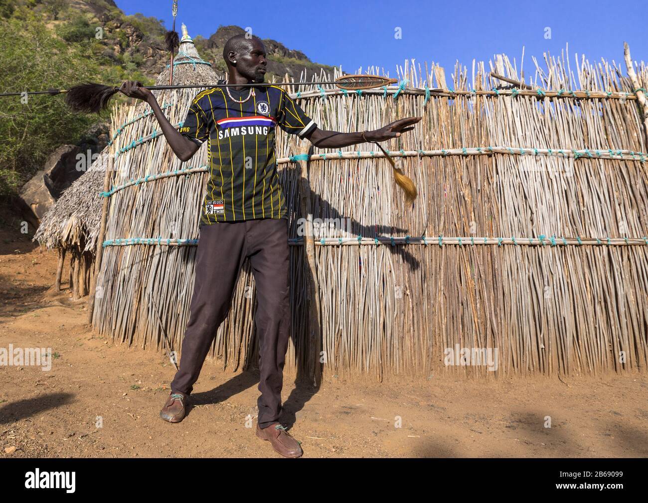Larim tribe man dancing during a wedding ceremony, Boya Mountains ...