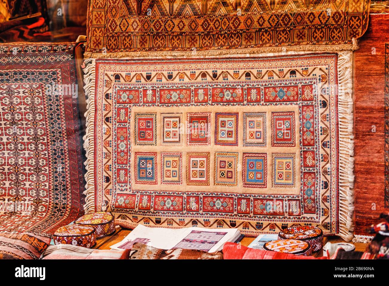 Turkish carpet in the storefront is on sale in the bazaar market Stock ...