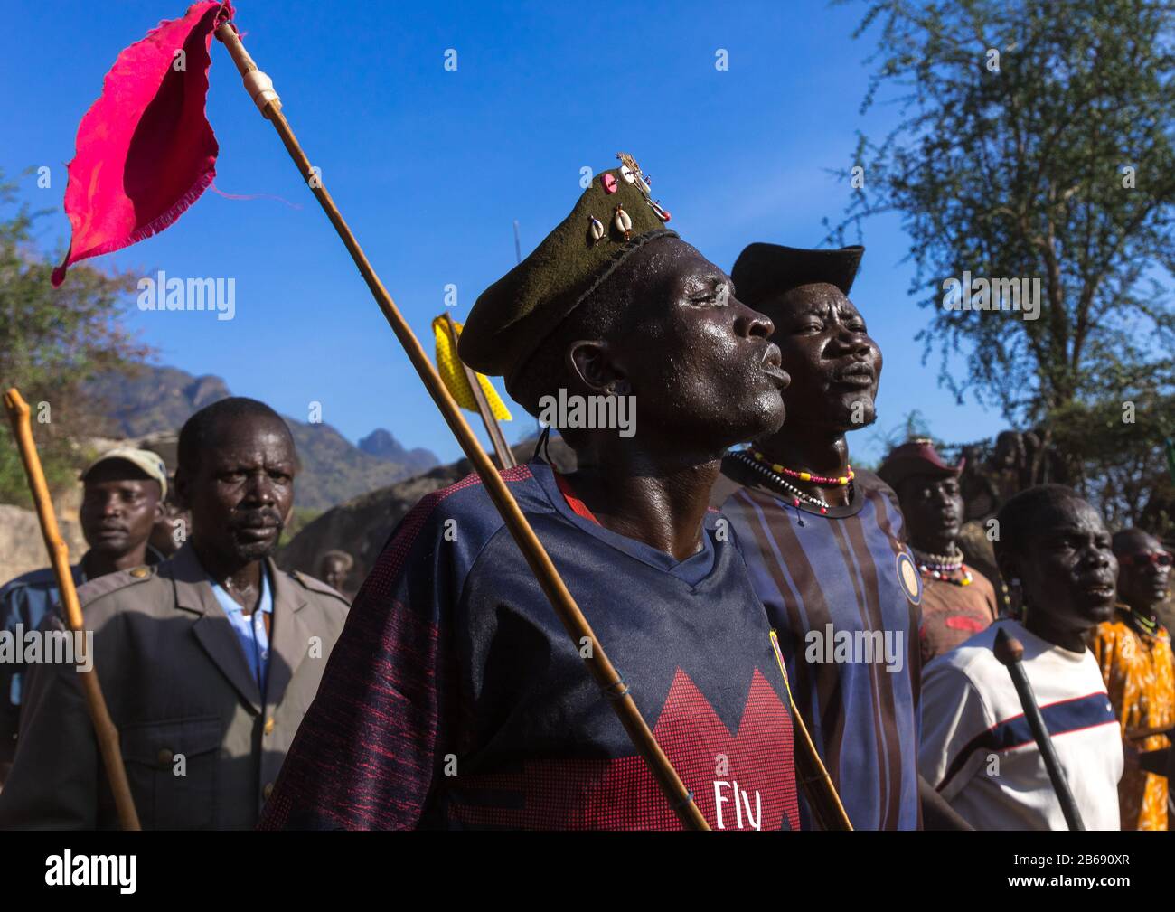 Larim tribe men dancing during a wedding ceremony, Boya Mountains ...