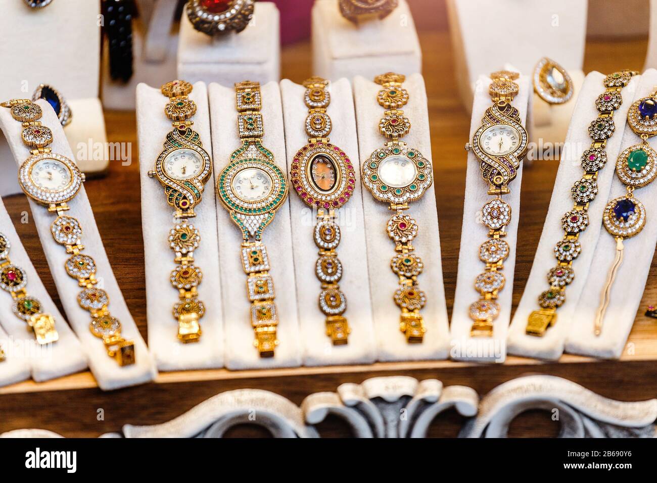 Luxury golden Watches for women on counter at the shop Stock Photo - Alamy