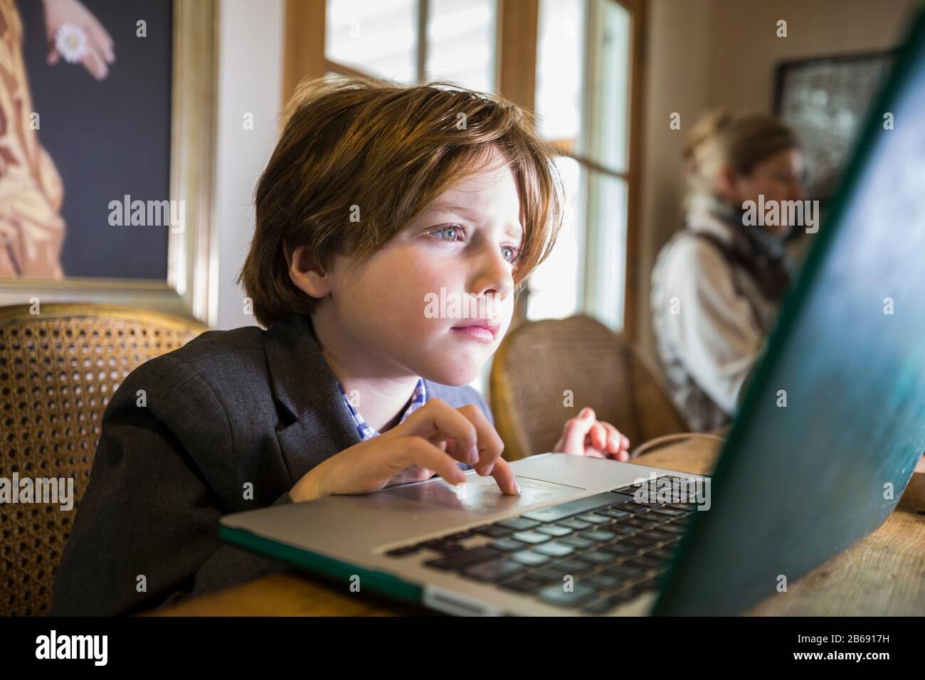 Boy typing hi-res stock photography and images - Alamy