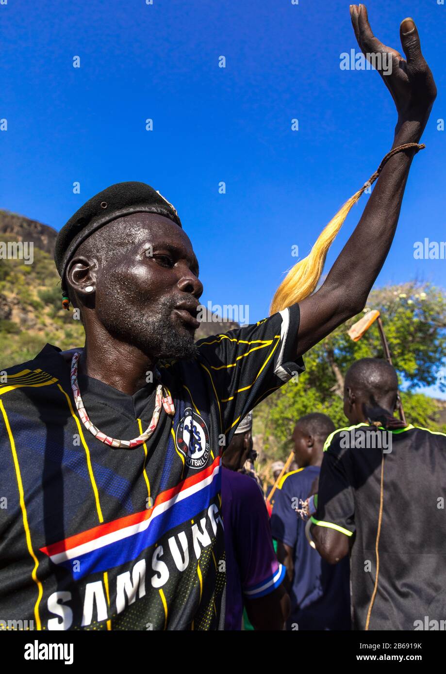 Larim tribe men dancing during a wedding ceremony, Boya Mountains ...