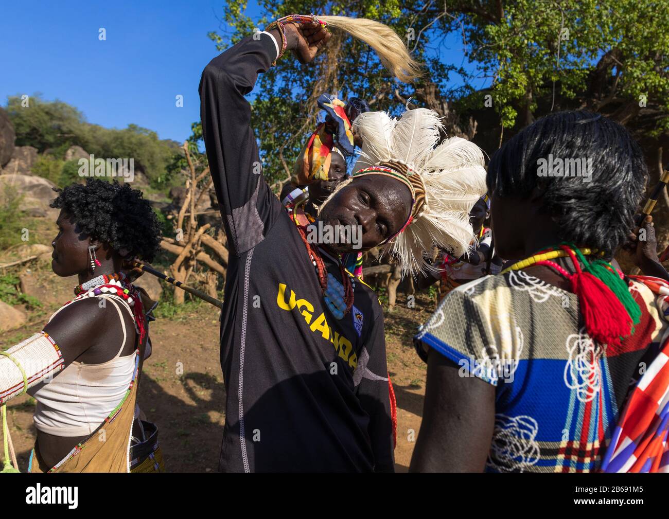 Larim tribe men and women dancing during a wedding celebration, Boya ...