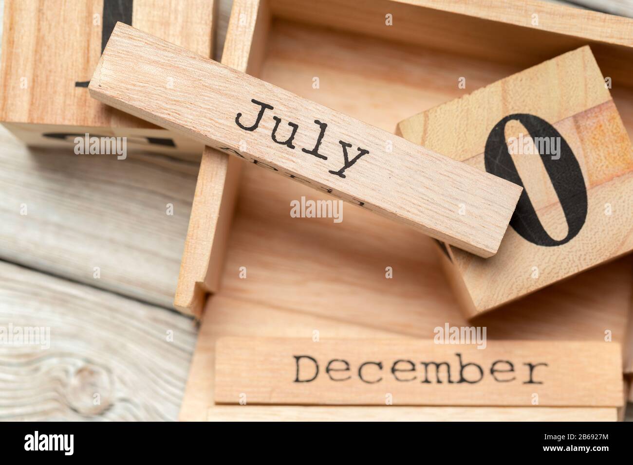top view of parts of wooden calendar on dark wooden tabletop Stock ...