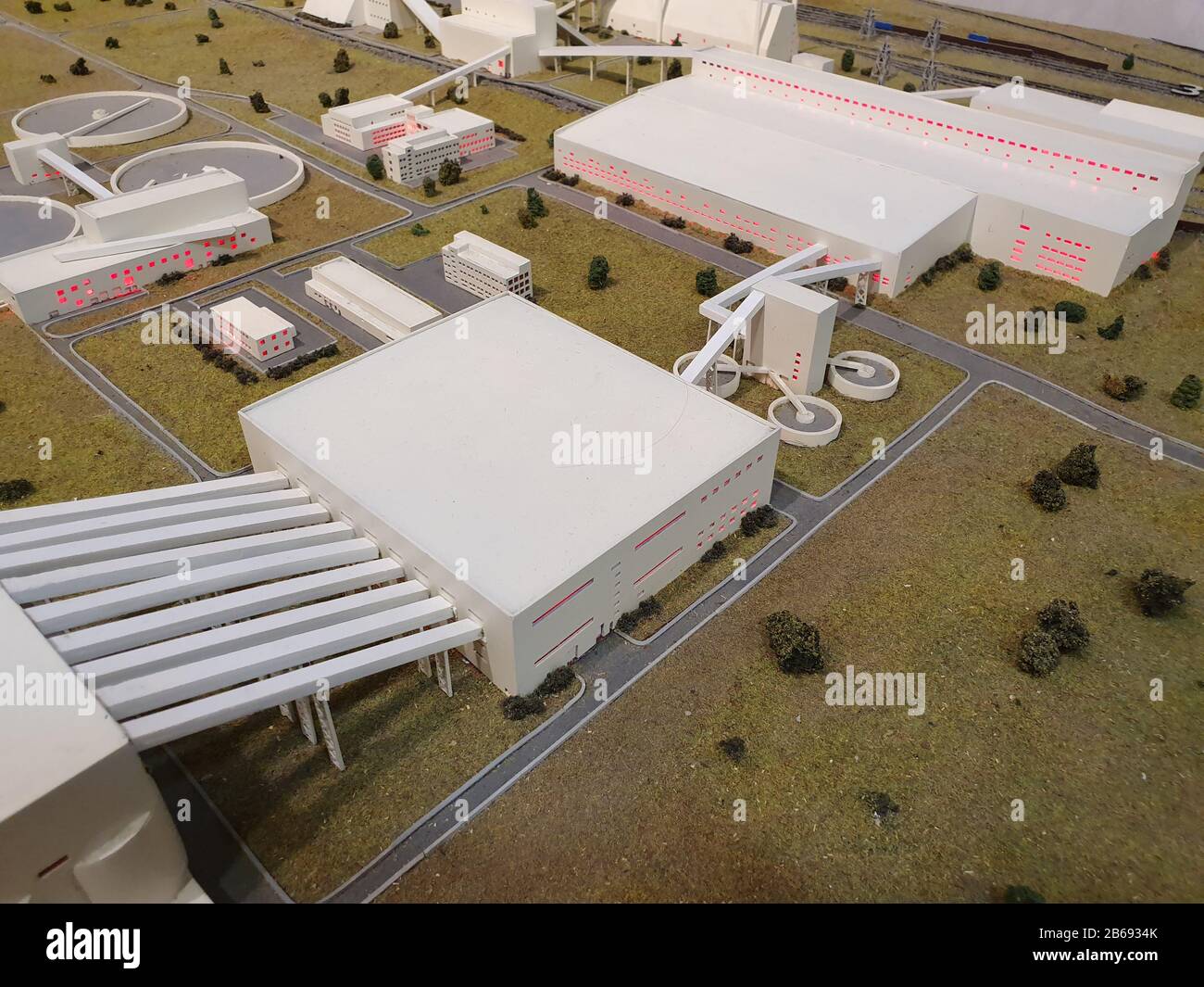 A model of a large factory or industrial complex. The copy is made of ...