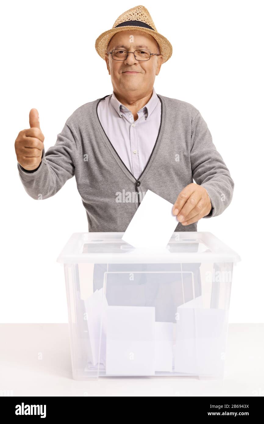 Senior citizen voting and showing thumbs up isolated on white ...