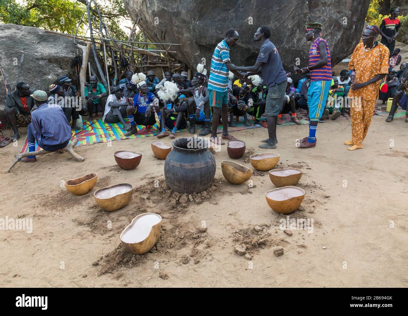 Larim tribe men drinking alcohol during a wedding ceremony, Boya ...