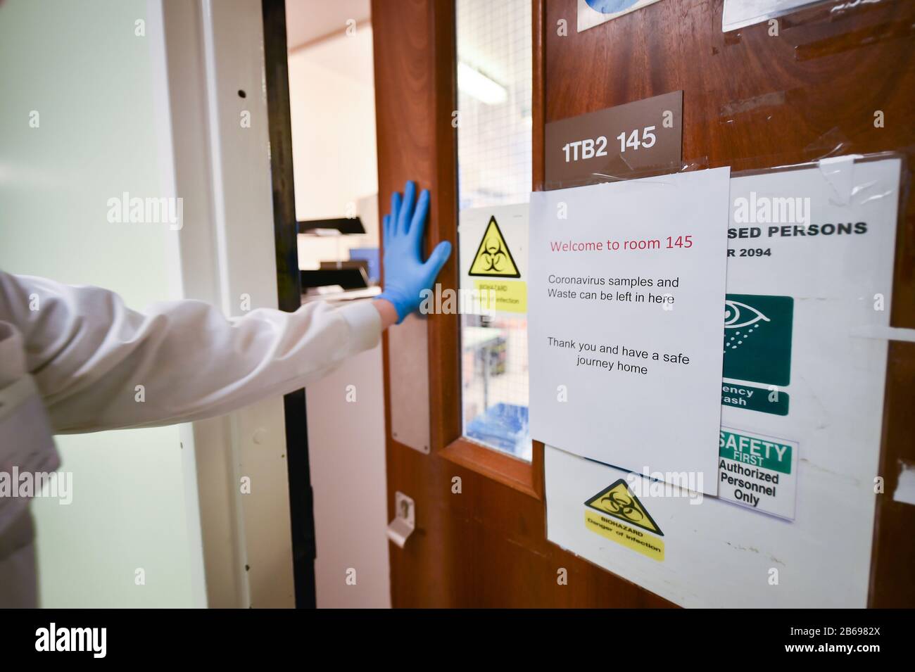 A person enters room 145 where Coronavirus COVID-19 is being tested in ...