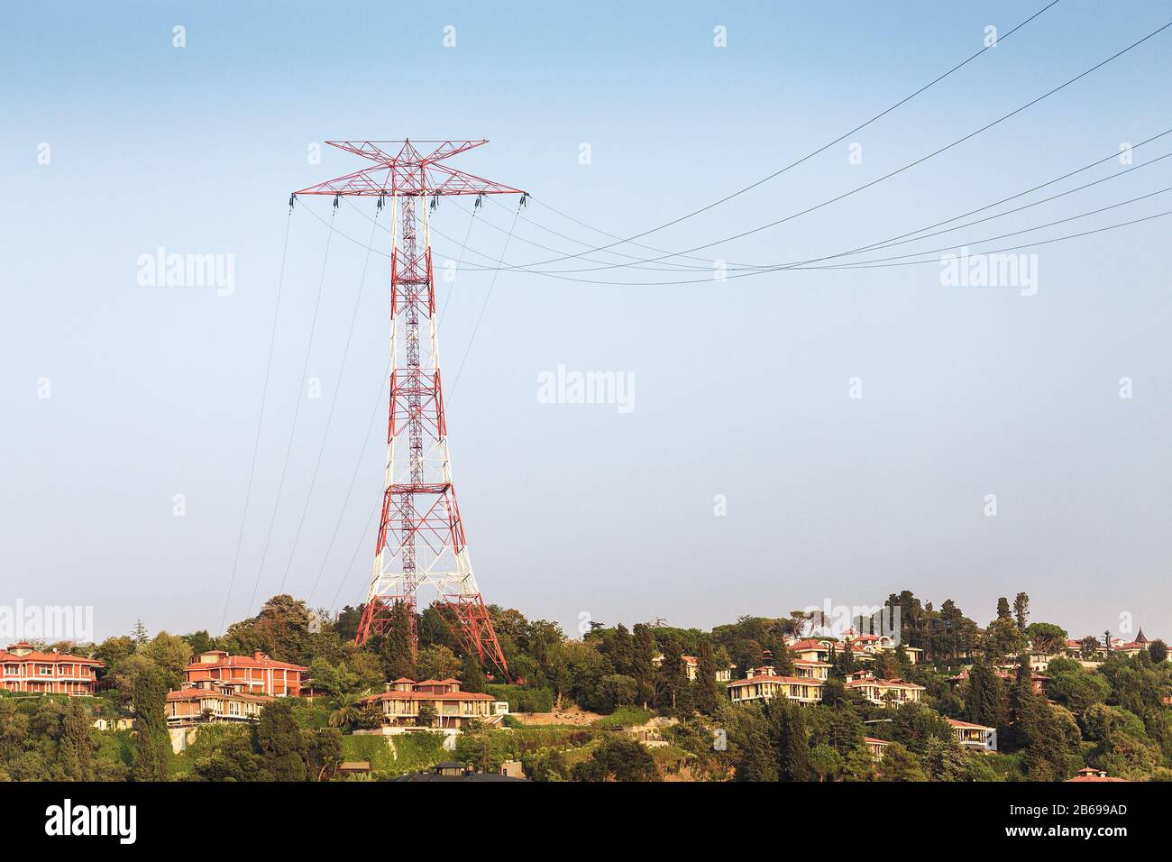 Electric power line on a hill with residential buildings in Istanbul ...