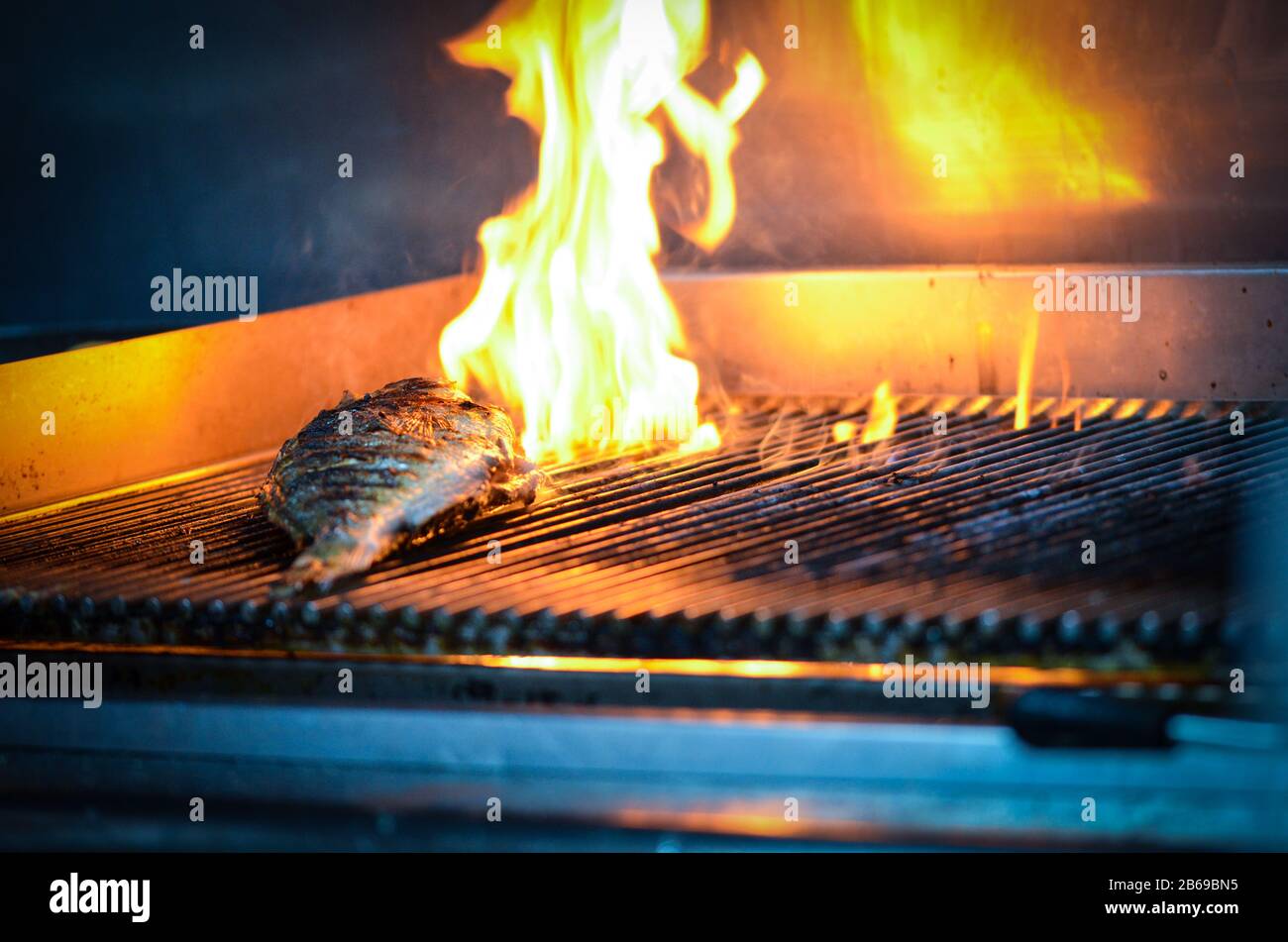 grilled fish with salt & pepper Stock Photo - Alamy