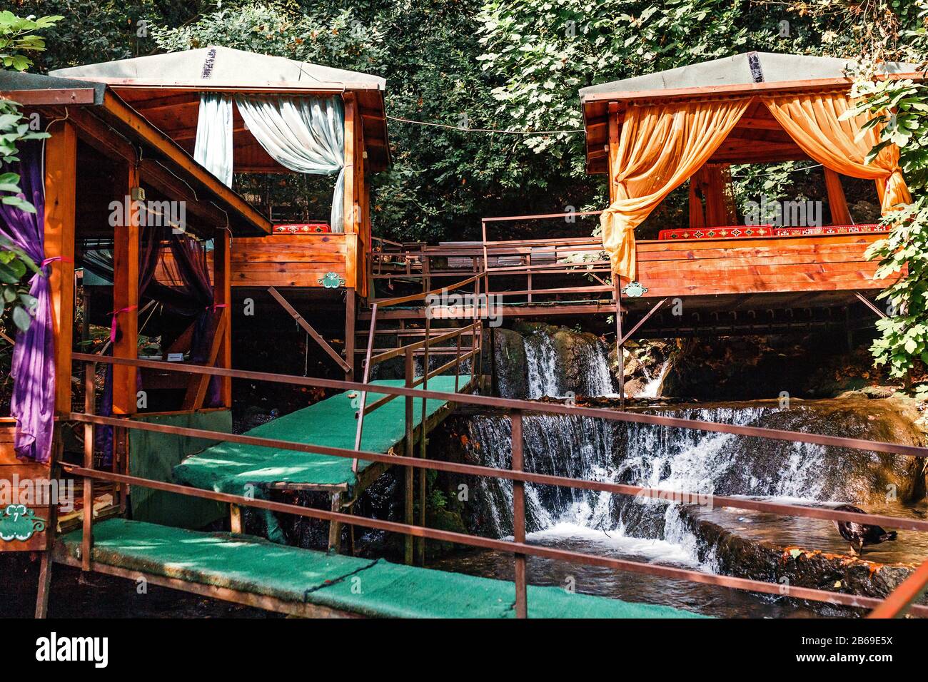 Terrace fish restaurant on mountain river in tropical jungle Stock ...