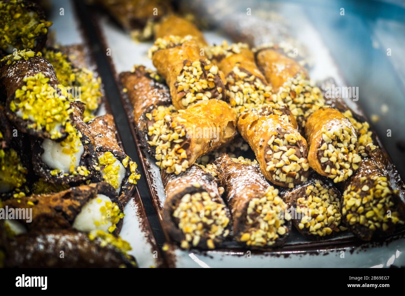 Cannoli sicily eating hi-res stock photography and images - Alamy