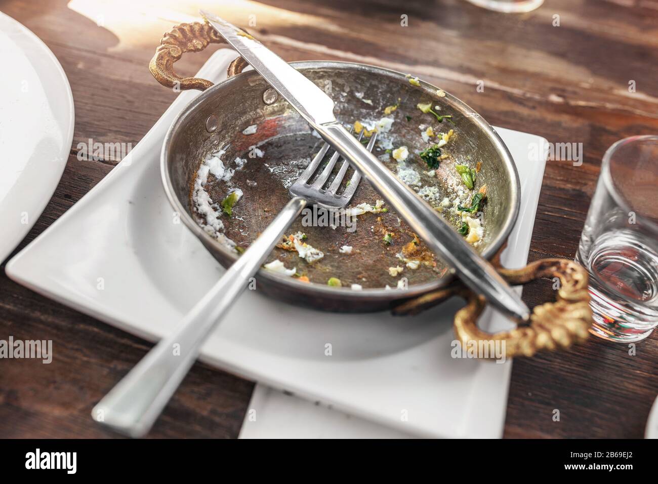 Dirty pan spoon in kitchen hi-res stock photography and images - Alamy