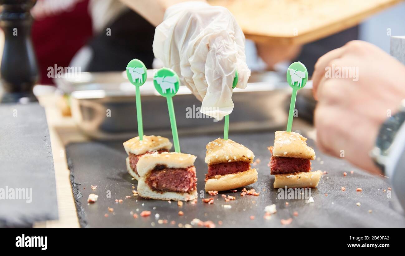 COLOGNE, OCTOBER 2019: Tasting of Beyond Meat Burger Patty at the ANUGA ...