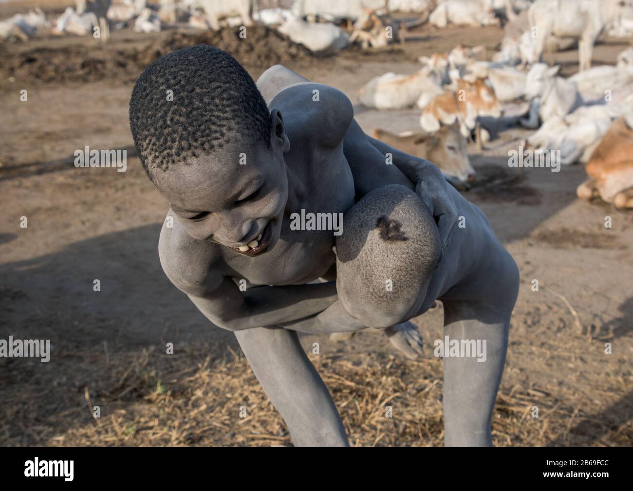 Mundari tribe boys wrestling in a cattle camp, Central Equatoria, Terekeka, South Sudan Stock ...