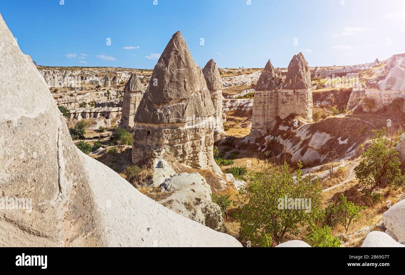 Volcanic tuff Rocks named fairy chimneys or mushrooms at sunset in ...