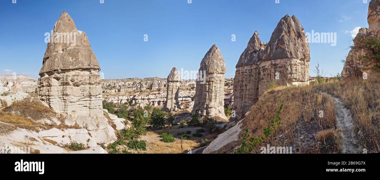 Volcanic tuff Rocks named fairy chimneys or mushrooms at sunset in ...