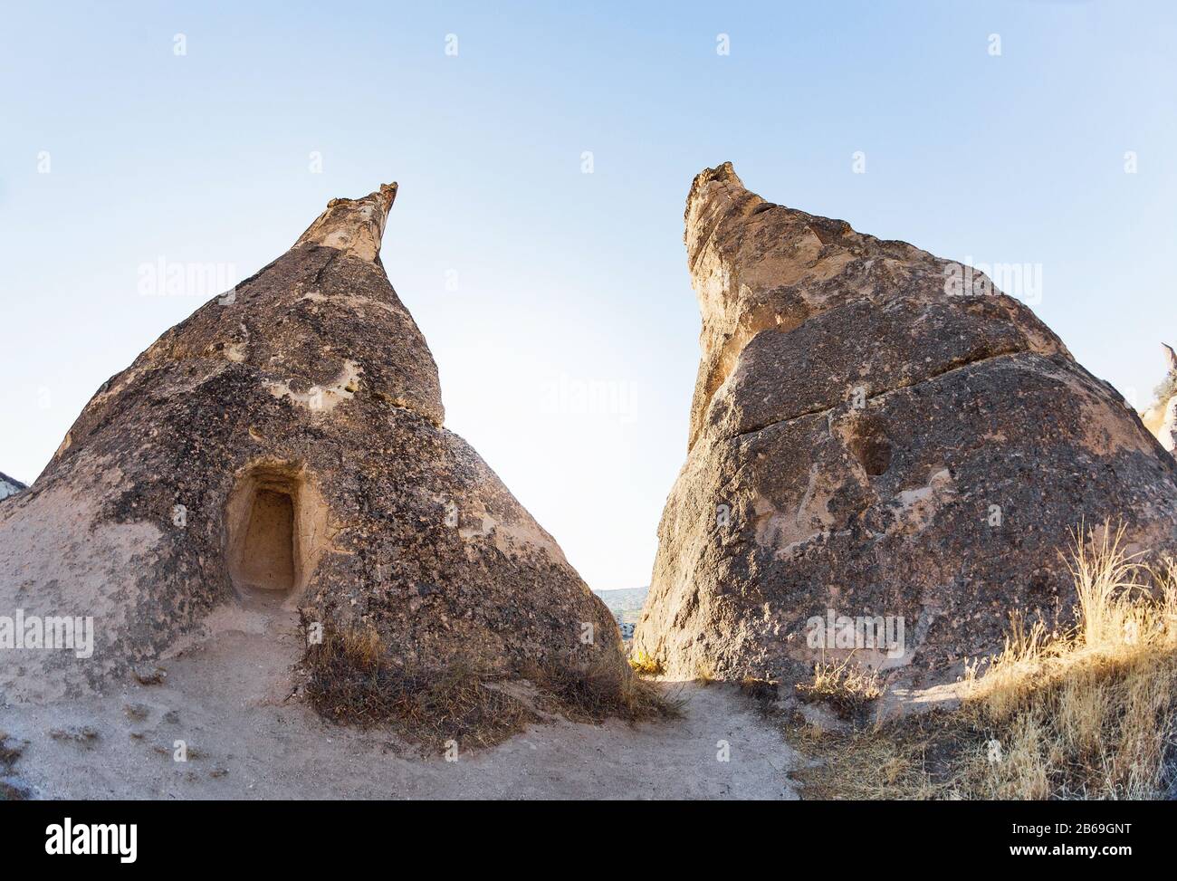 Volcanic tuff Rocks named fairy chimneys or mushrooms at sunset in ...