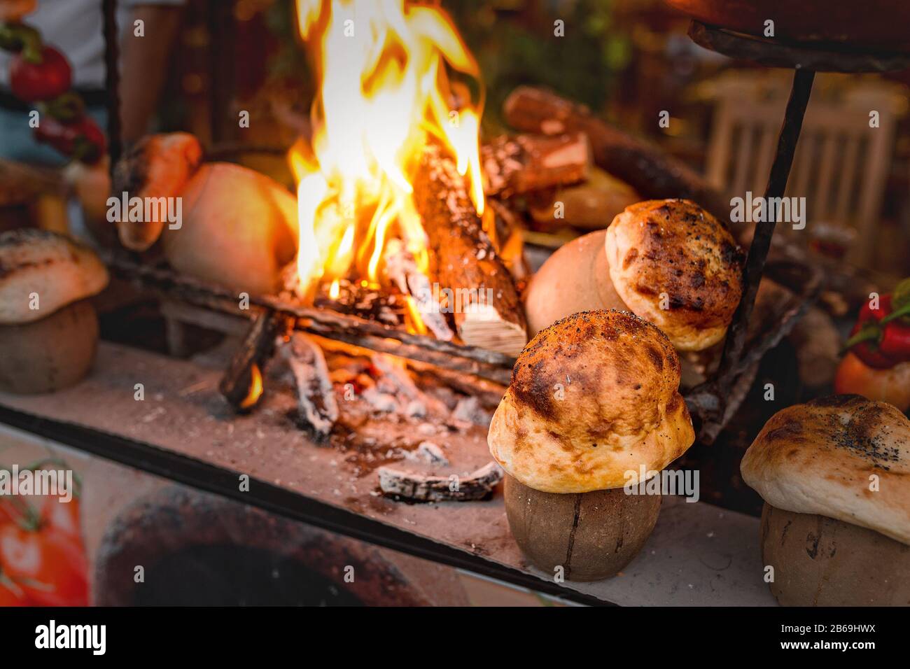 traditional Turkish Testi Kebab cooked in clay pot on open fire at ...