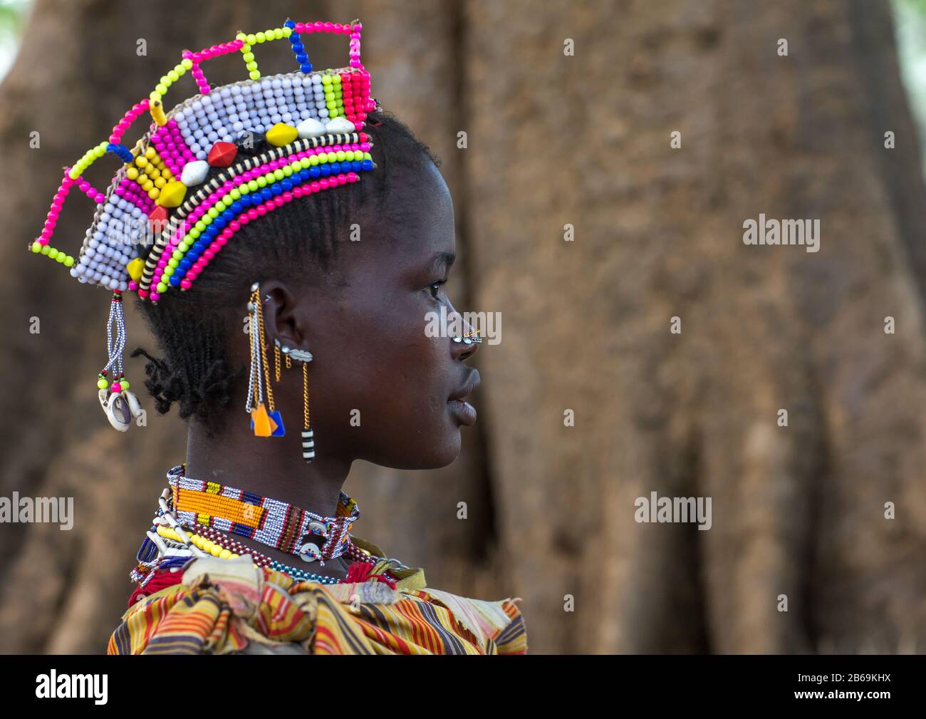 Larim tribe woman with traditional decorations on the head, Boya ...