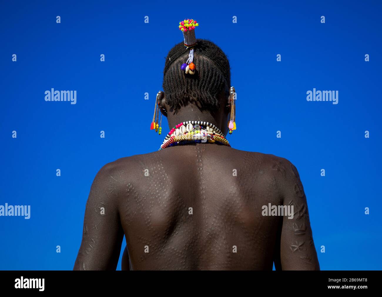 Tribal woman scars on back hi-res stock photography and images - Alamy
