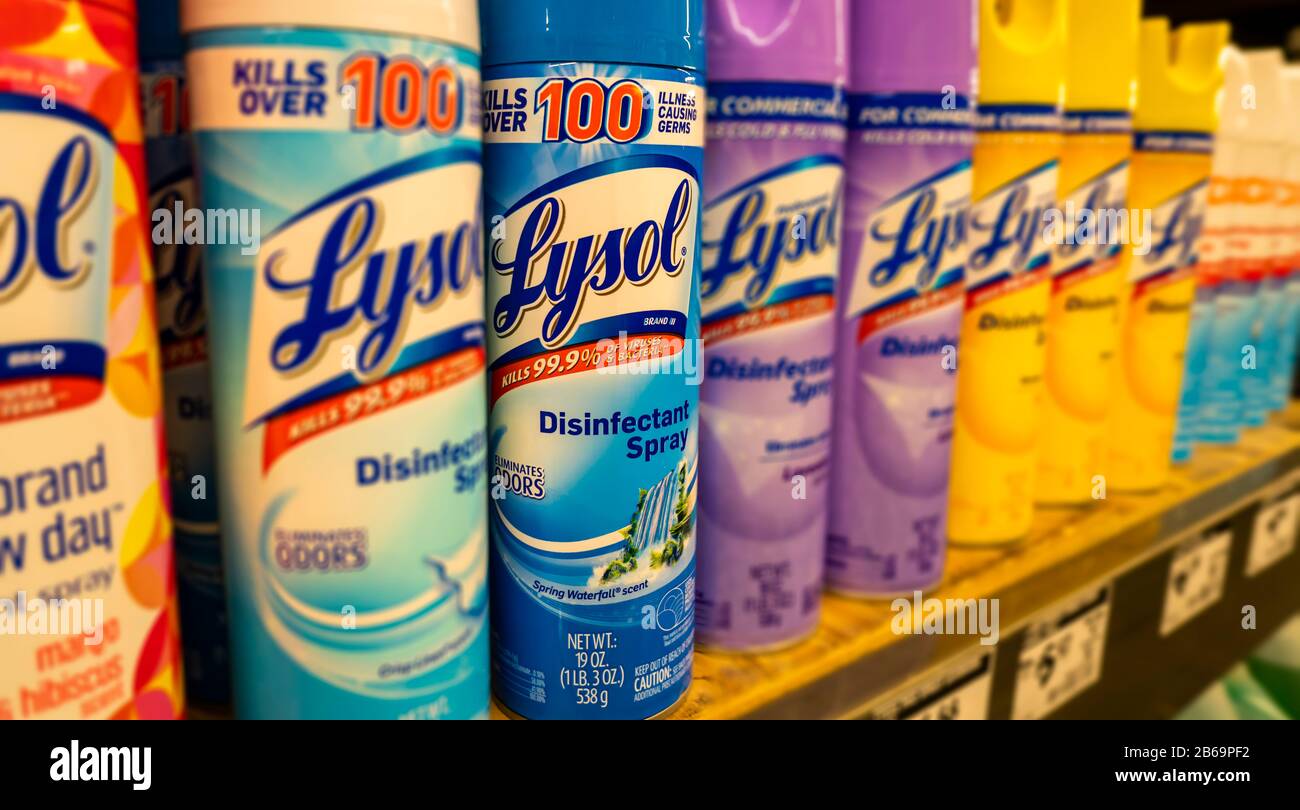 Containers Lysol disinfecting products are seen on a shelf in a ...