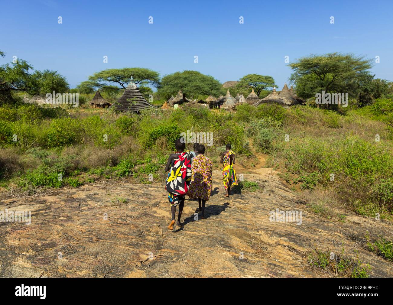 Larim tribe girls coming to theit village, Boya Mountains, Imatong ...