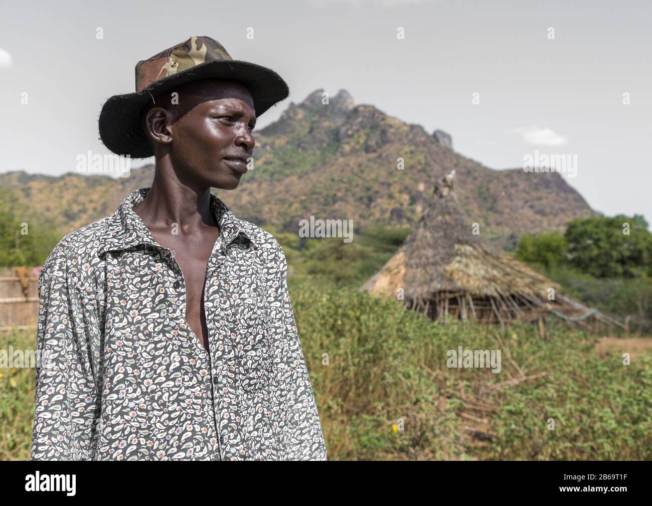 Portrait of a Larim tribe young man with a hat, Boya Mountains, Imatong ...