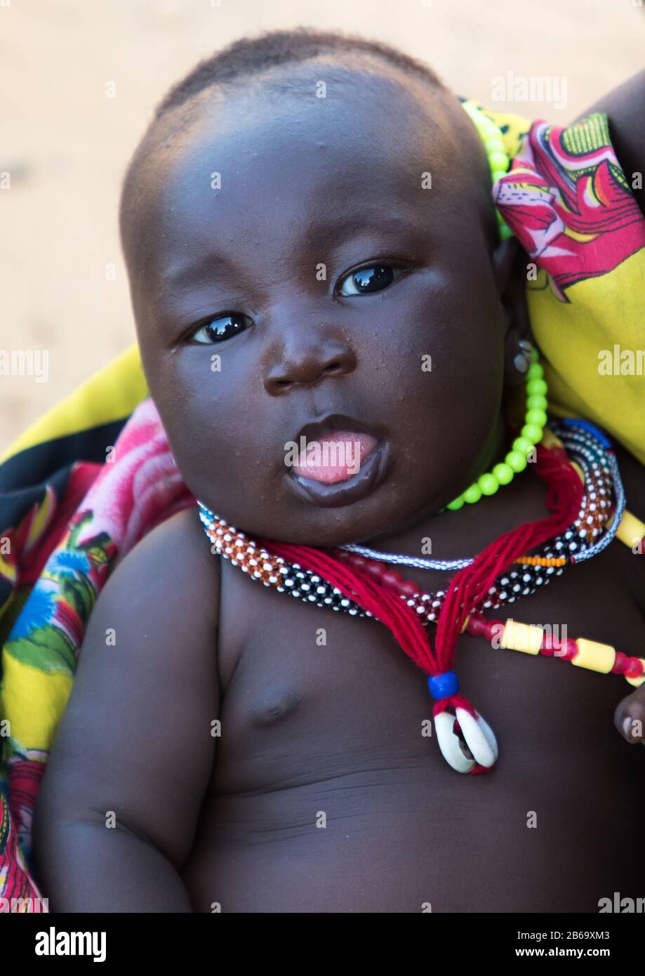 Larim tribe baby wearing necklaces, Boya Mountains, Imatong, South ...