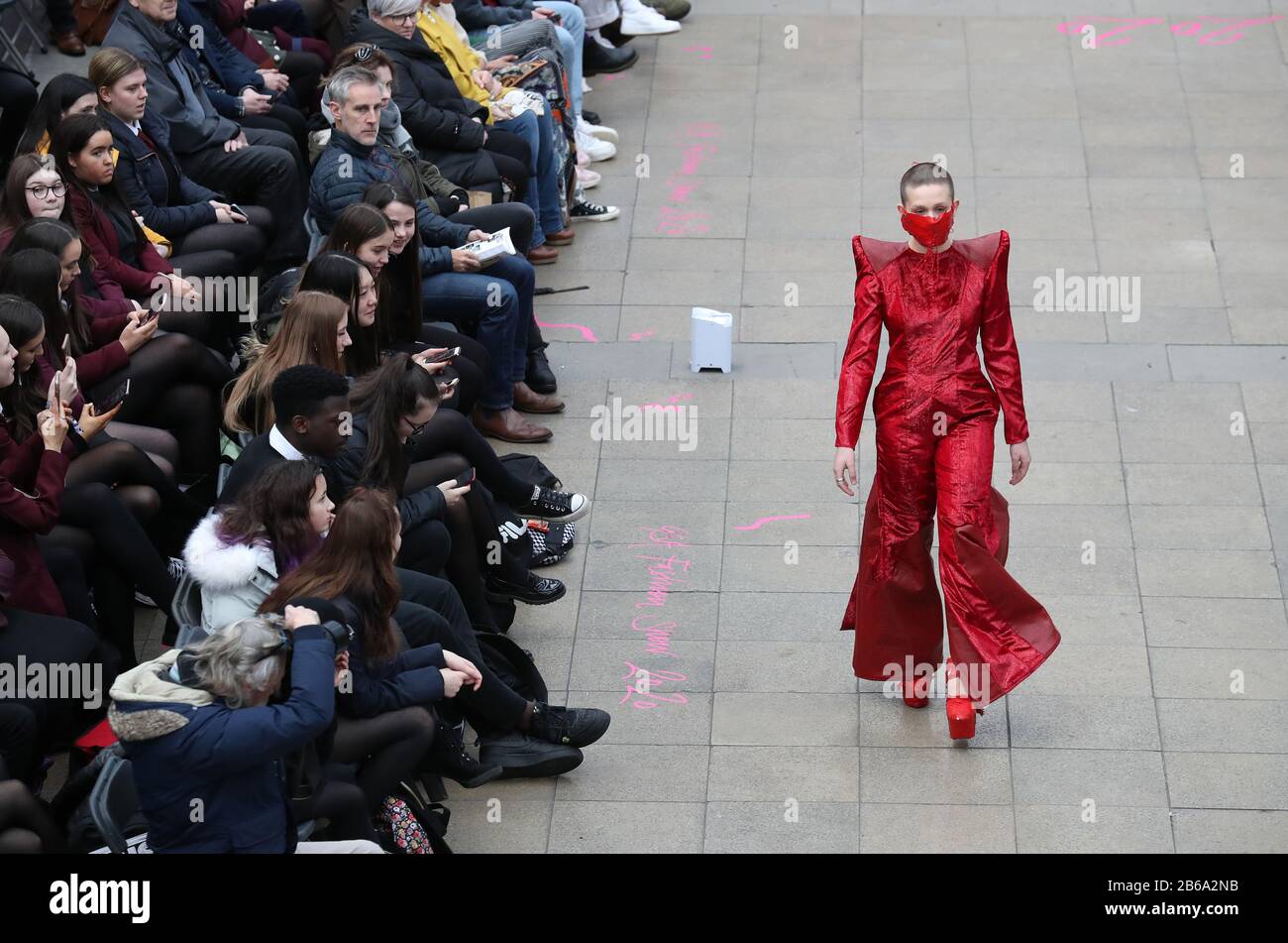 Model Hannah Findlay wears an outfit designed by fashion design student ...