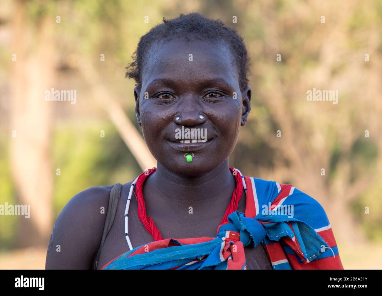 Portrait of a smiling Larim tribe woman, Boya Mountains, Imatong, South ...