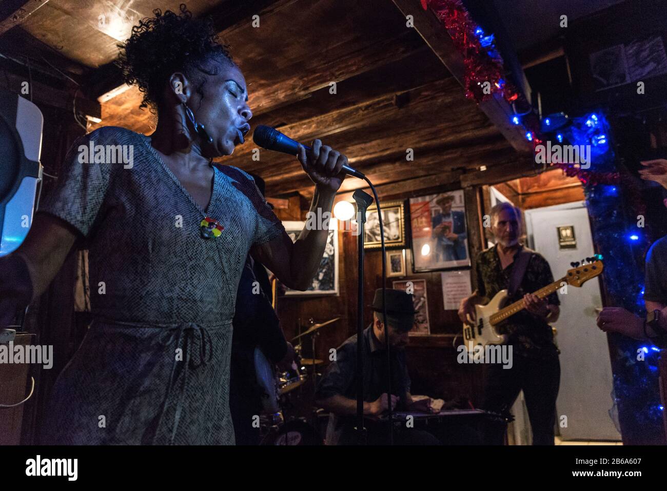 New York City, USA - August 4, 2018: Black woman singing with a band in ...