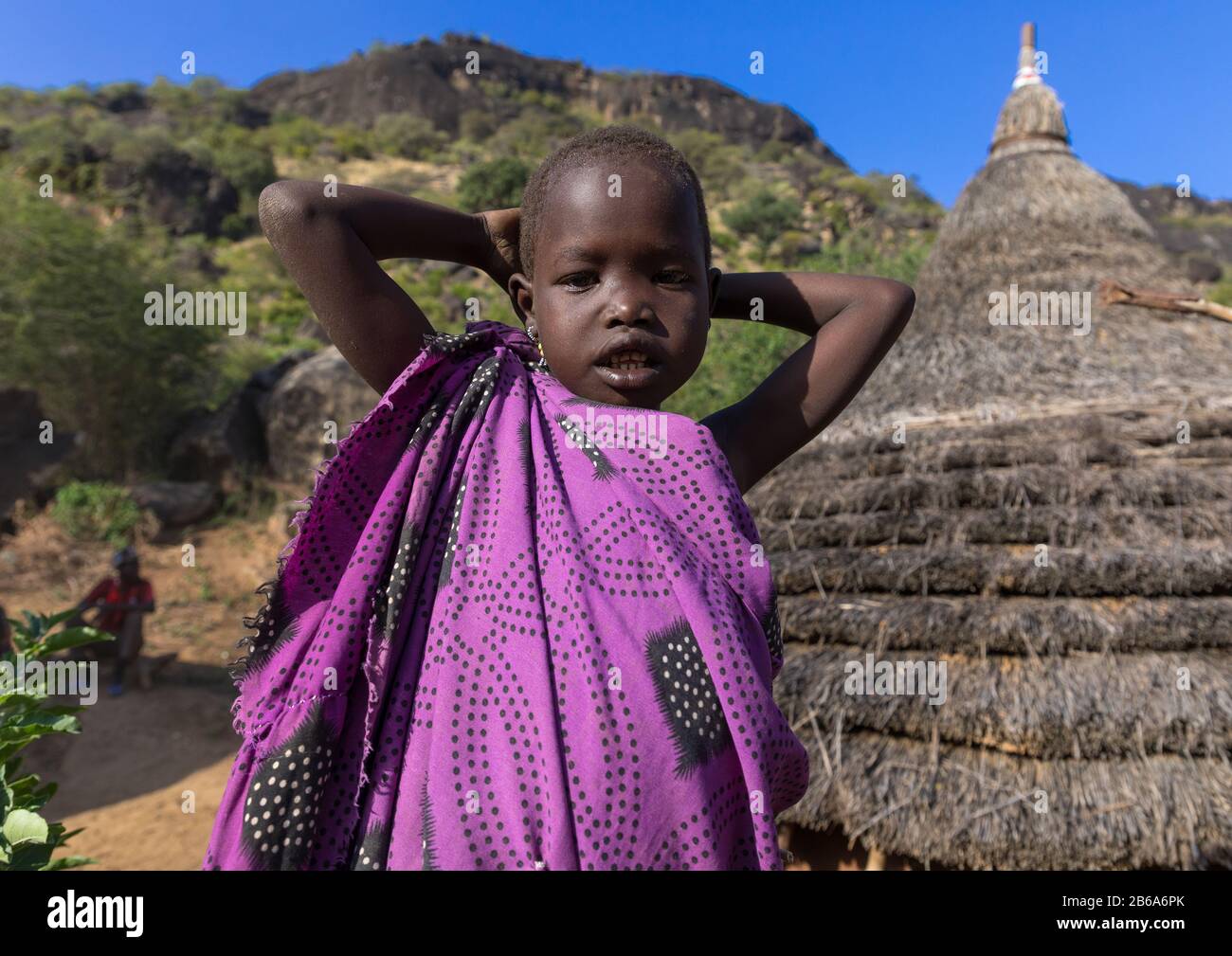 Girl in a Larim tribe traditional village, Boya Mountains, Imatong ...
