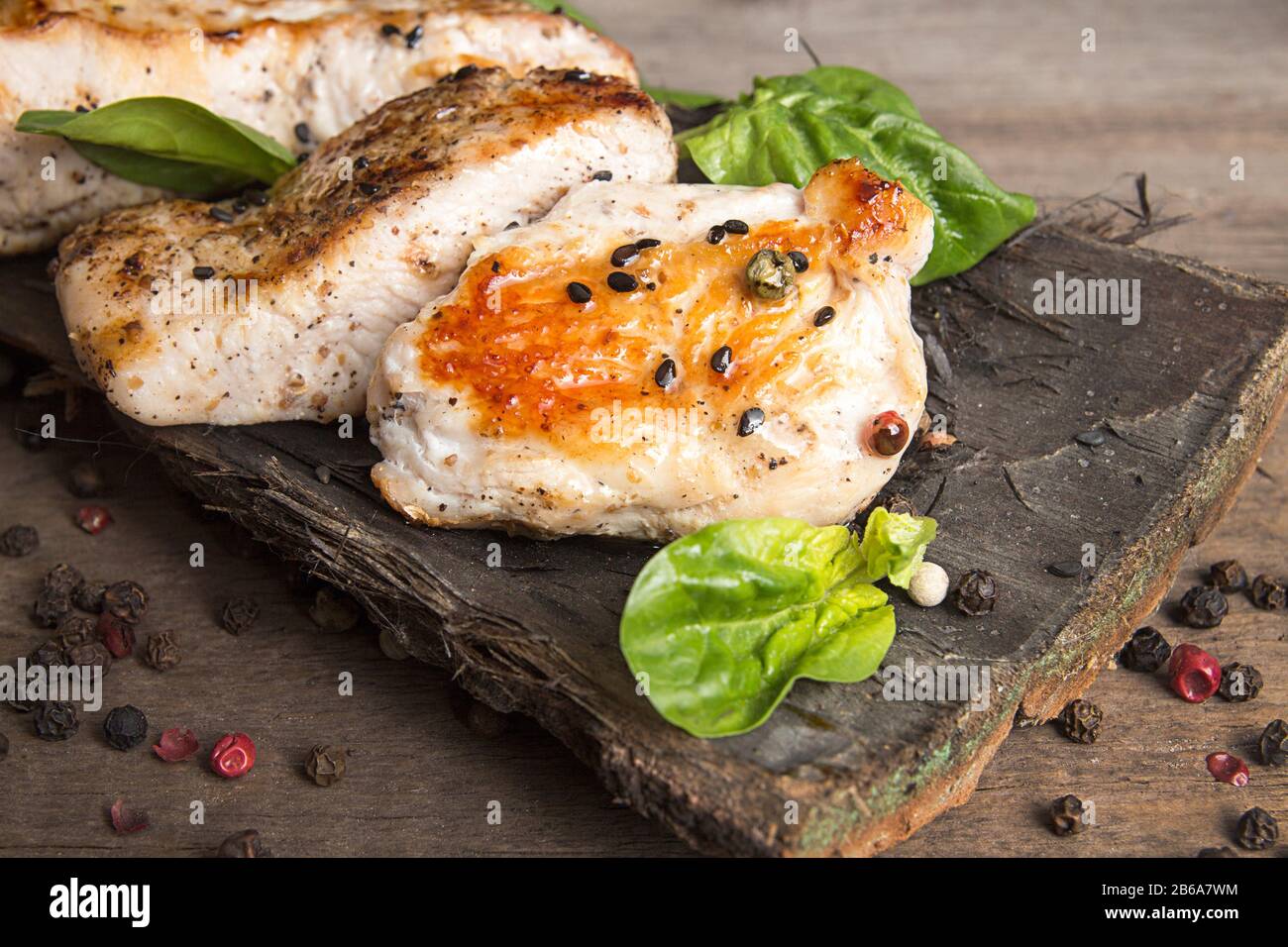 Grilled turkey fillet with bright appetizing roasted crust garnish ...