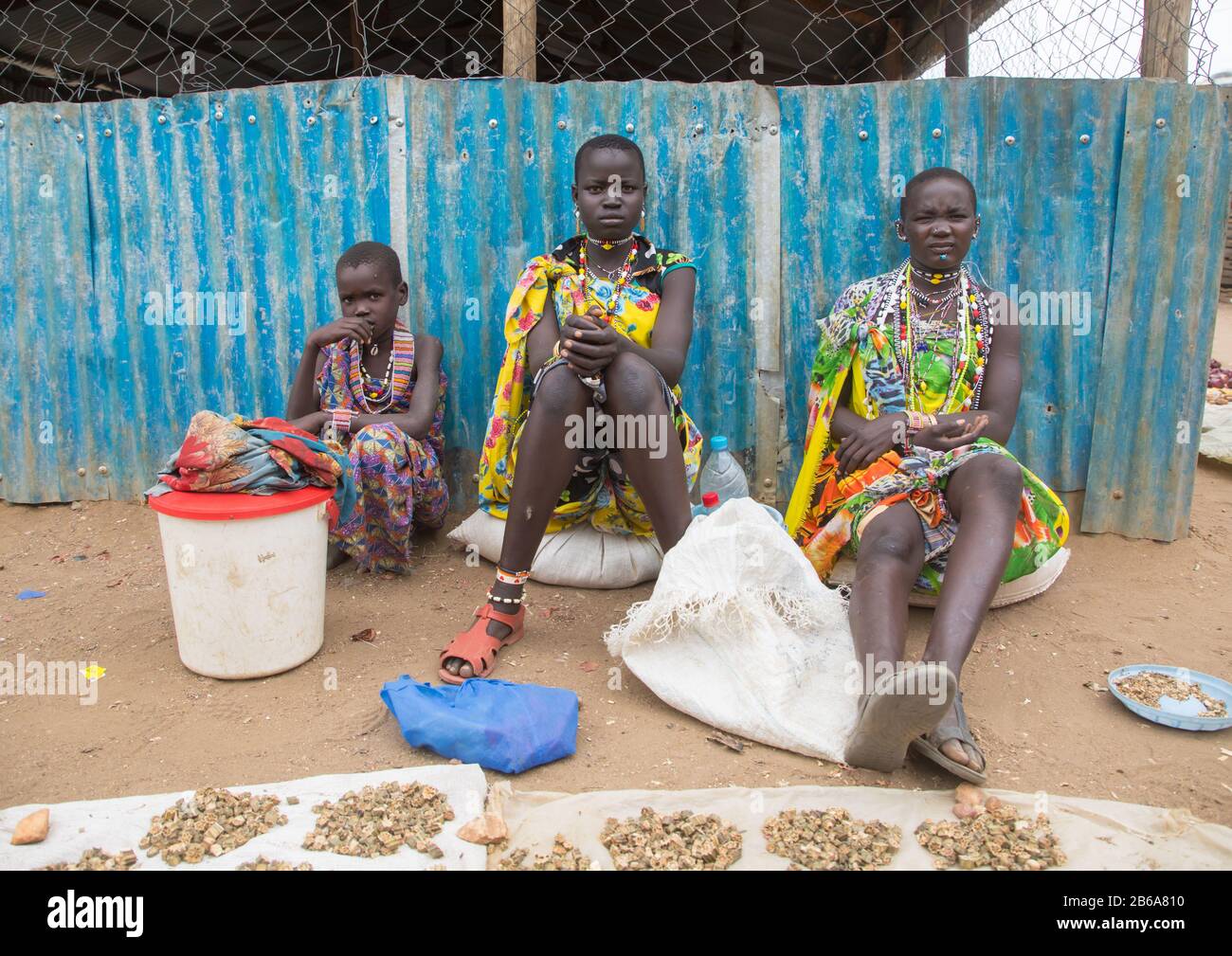Toposa tribe women in traditional clothing in a market, Namorunyang ...