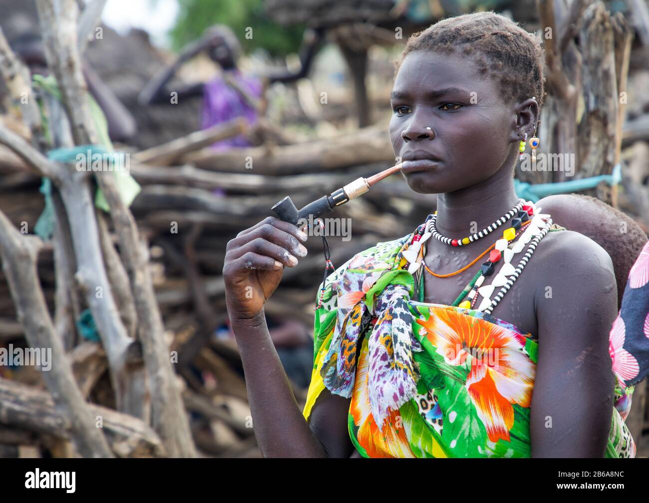 African tribe women smoking pipe hi-res stock photography and images ...