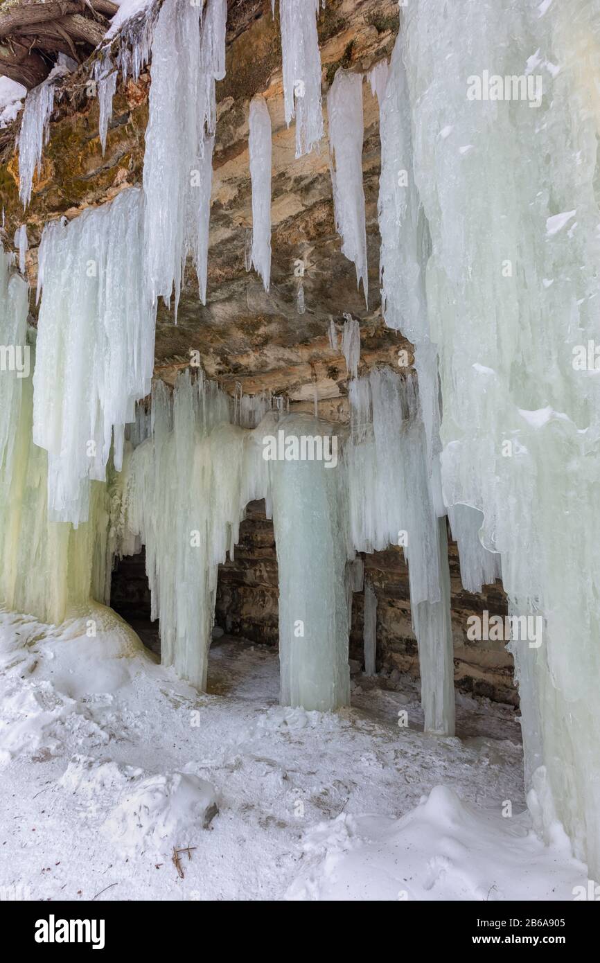 Ice Curtains hang from the entrance to Eben Ice Caves in the Upper ...
