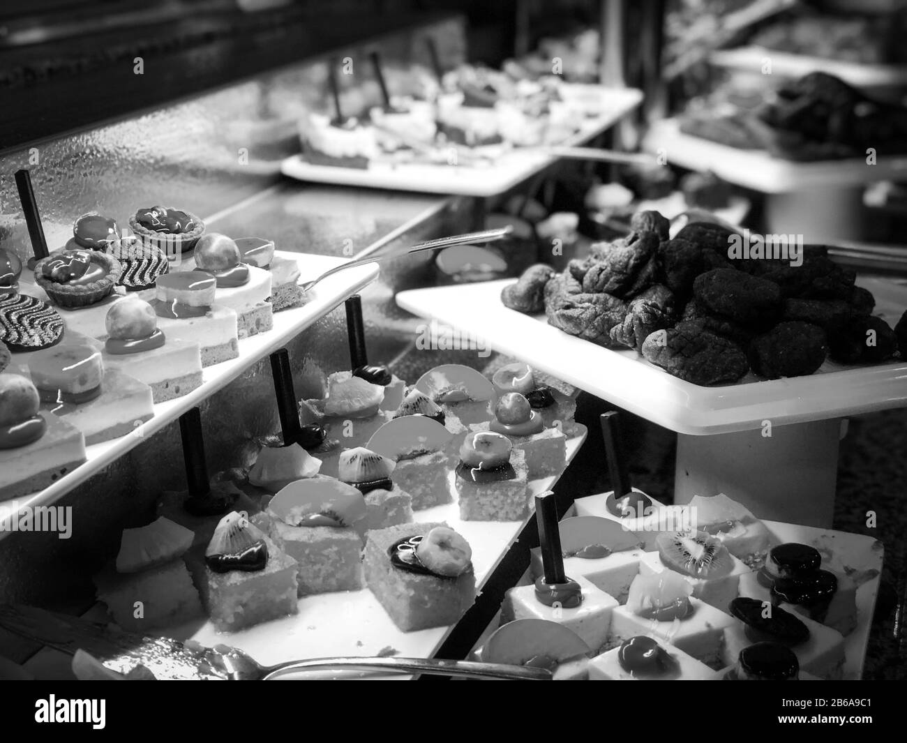 mix mini cakes & sweets with fresh fruits & glazed topping Stock Photo ...