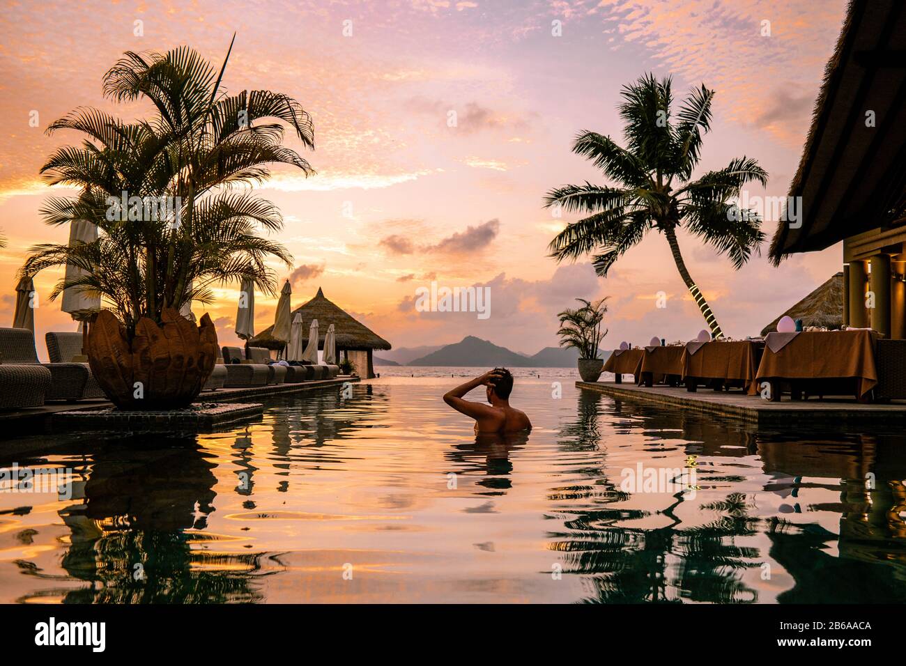 Luxury swimming pool in tropical resort, relaxing holidays in ...