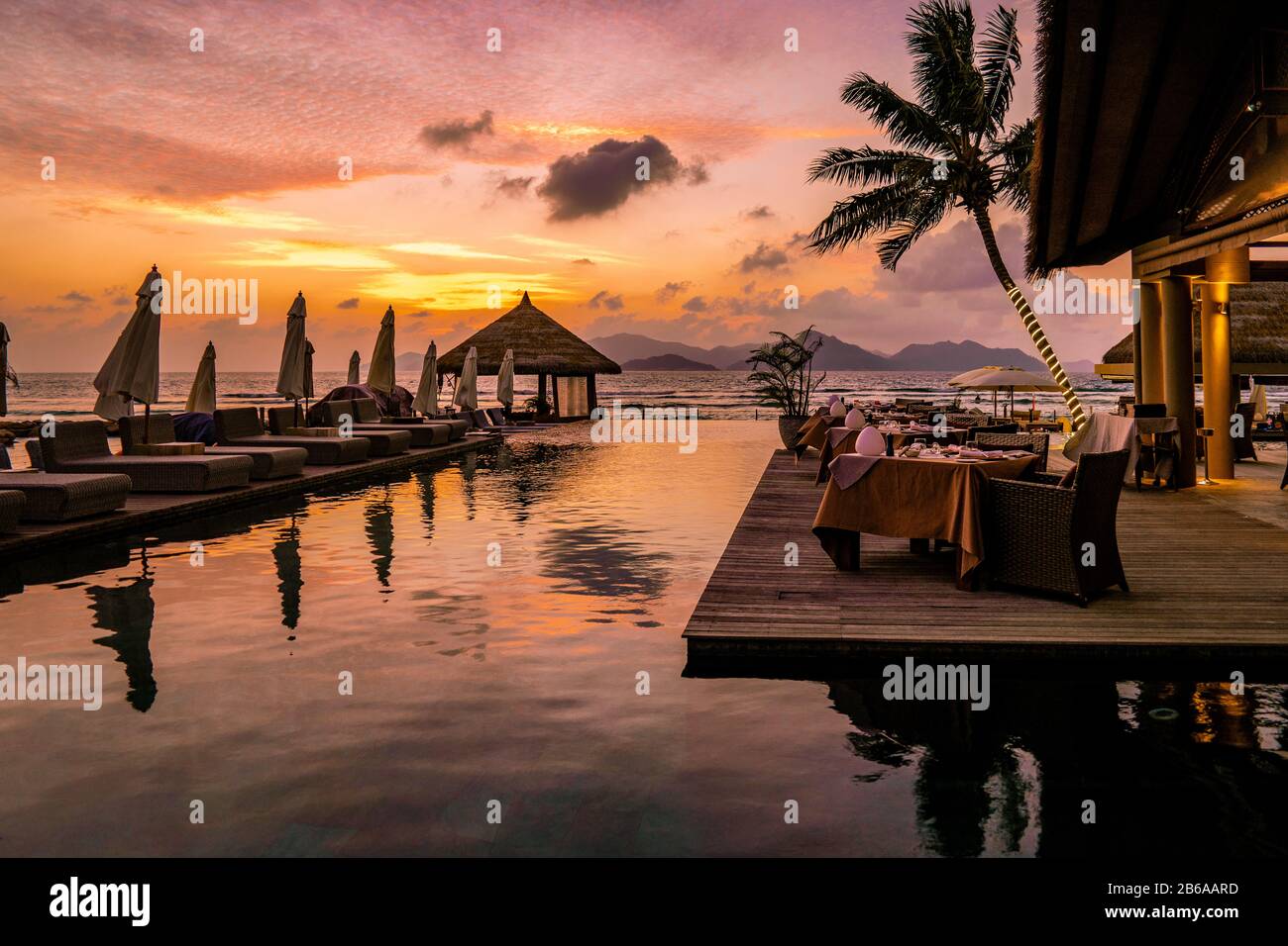 Luxury swimming pool in tropical resort, relaxing holidays in ...