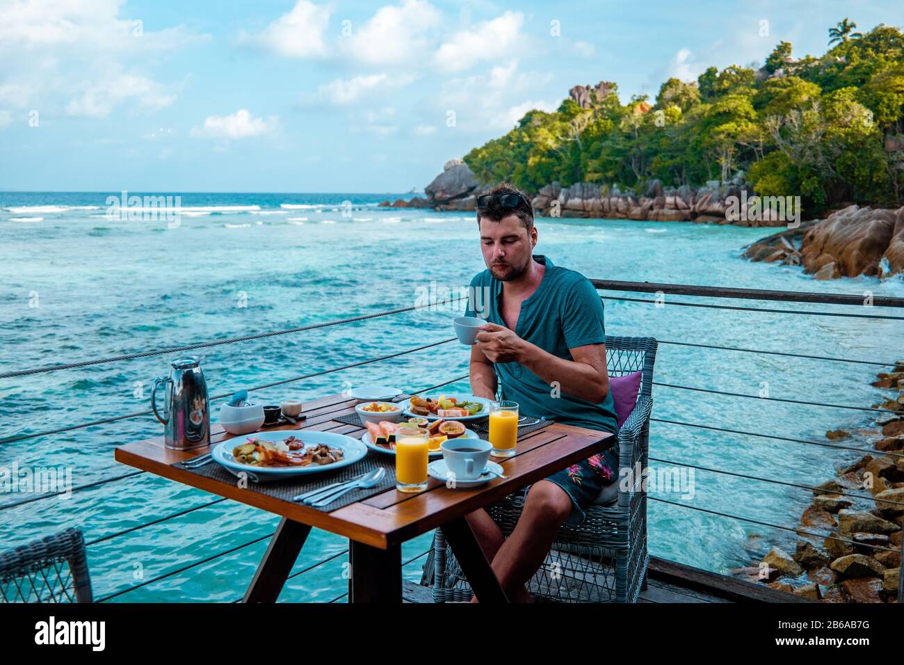 Indian man eating breakfast hi-res stock photography and images - Alamy