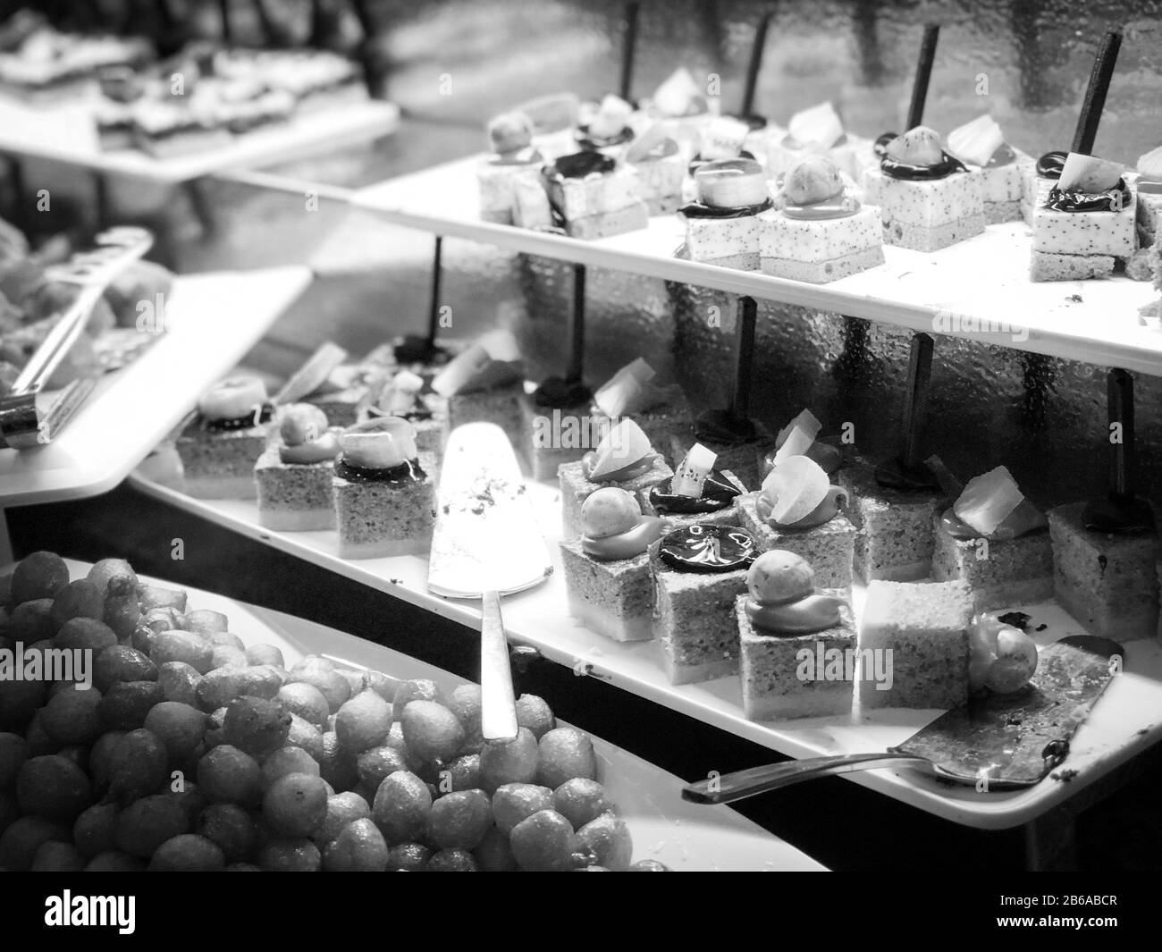 mix mini cakes & sweets with fresh fruits & glazed topping Stock Photo ...