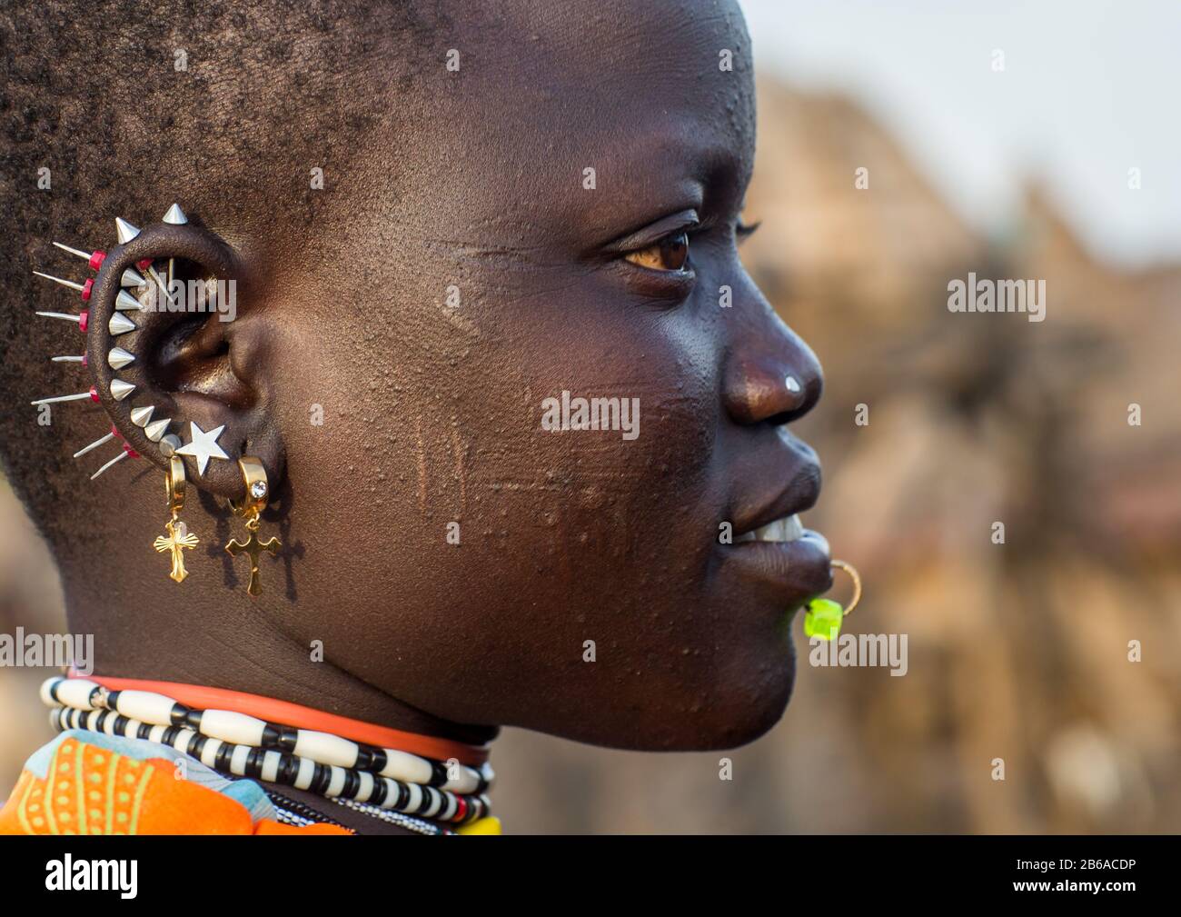 Portrait of a Toposa tribe woman with scarifications on the cheek ...